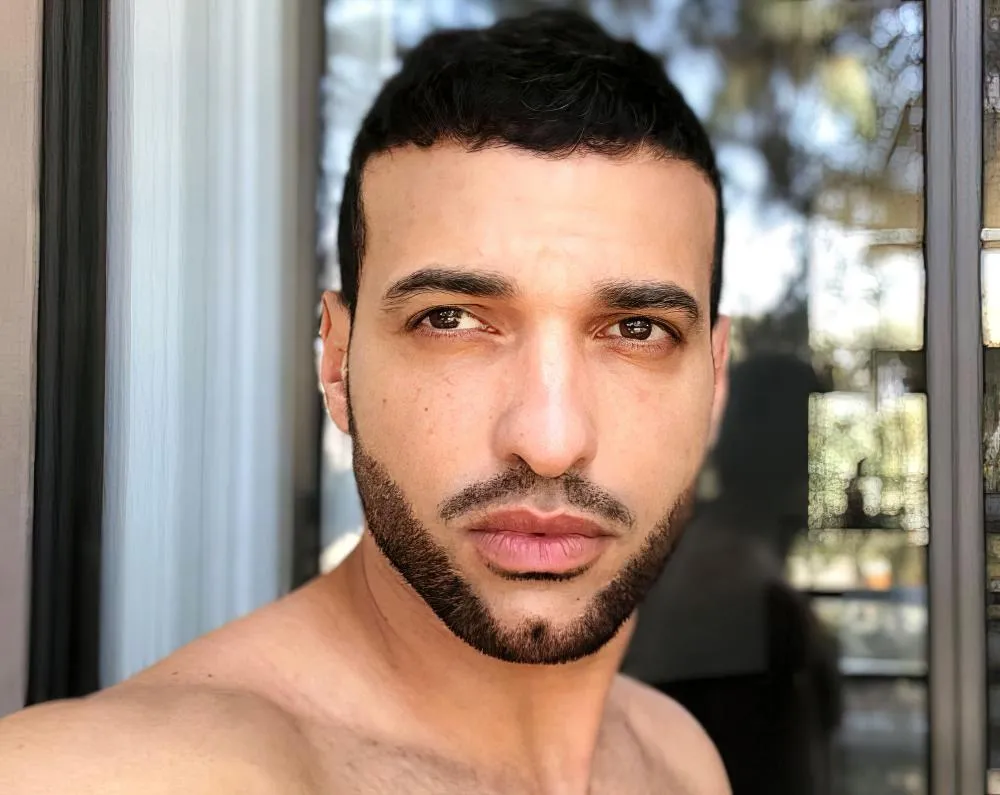 Out 'Eternals' Star Haaz Sleiman Praises Disney's Refusal to Cut Gay ...
