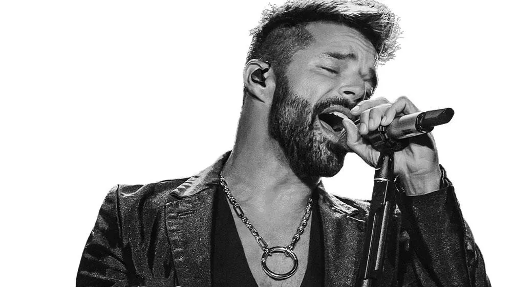 2023 Rewind: Watch Ricky Martin Go Buff and Get Covered in Paint on ...